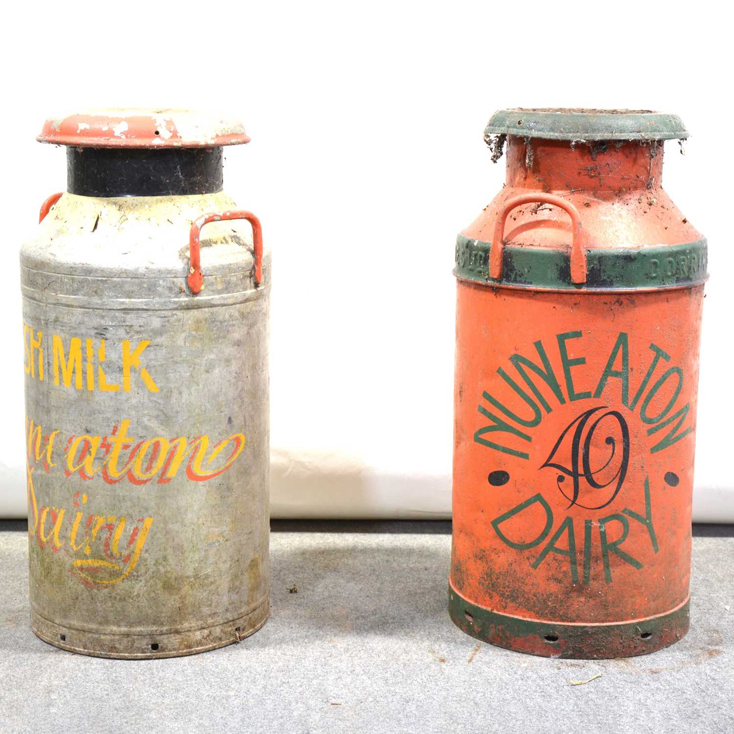 Lot 513 - Two galvanised metal milk churns,