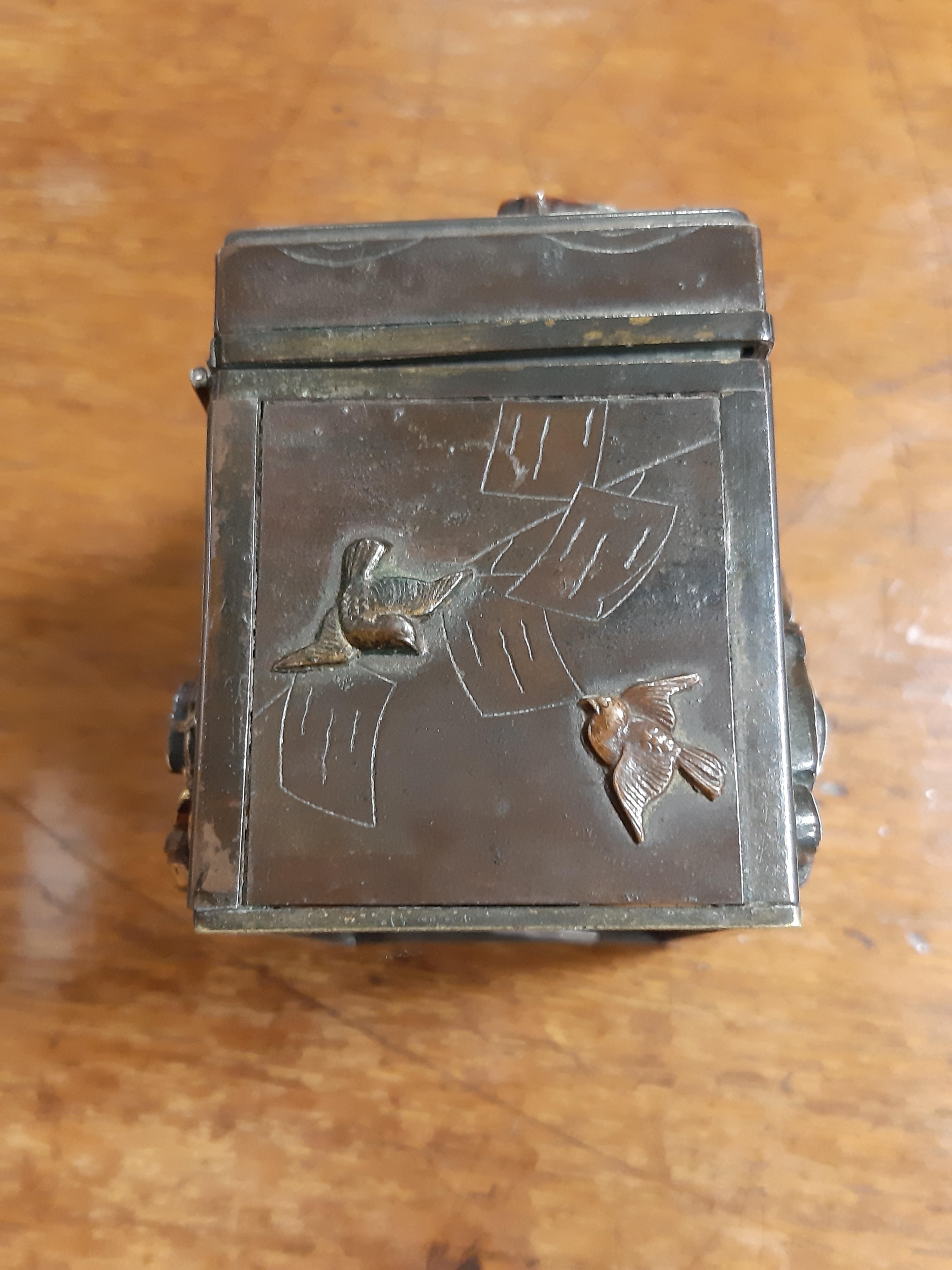 Lot 130 - Small Japanese shakudo box and cover, Meiji