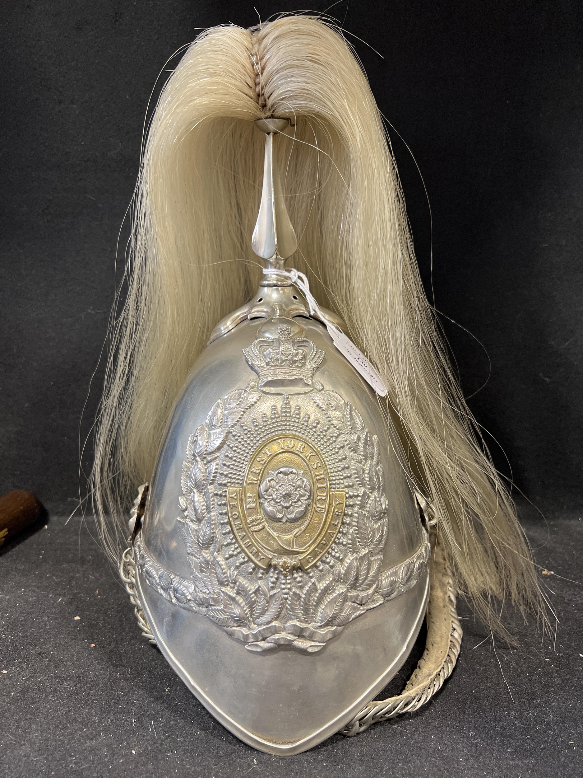 Lot 130 - 1st West Yeomanry helmet, with tin,