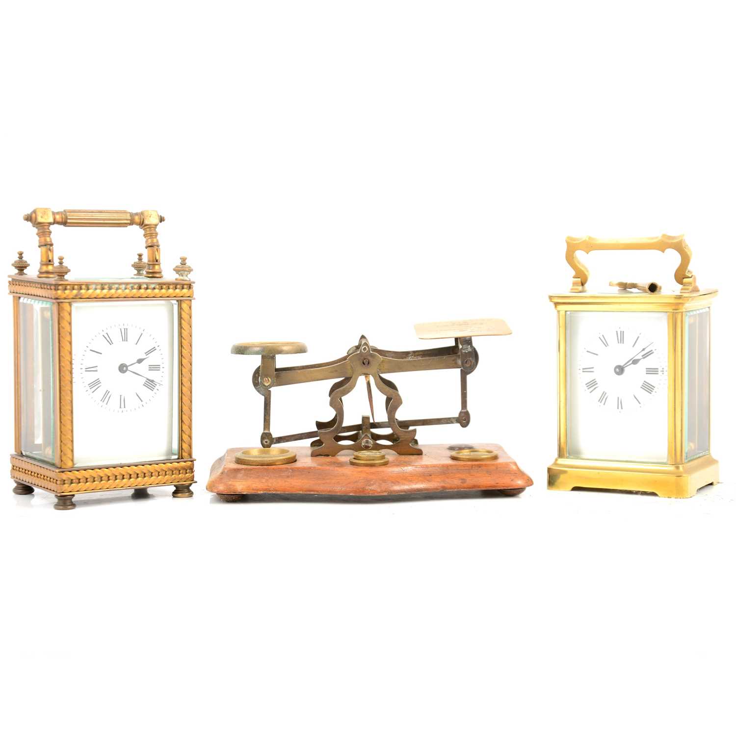 Lot 110 - Two brass cased carriage clocks and a set of