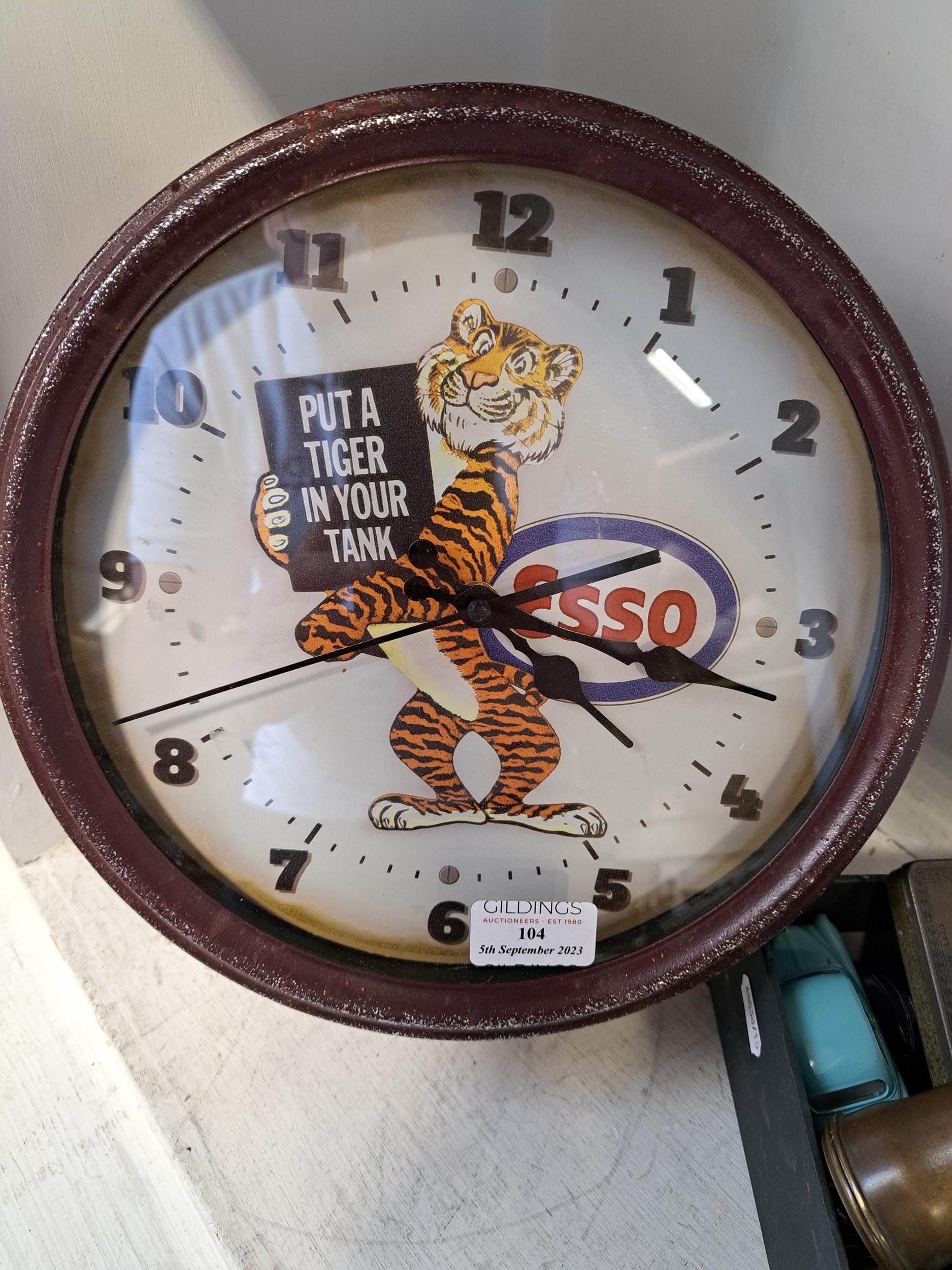 Lot 104 - Esso wall clock, die cast vehicles, snuff