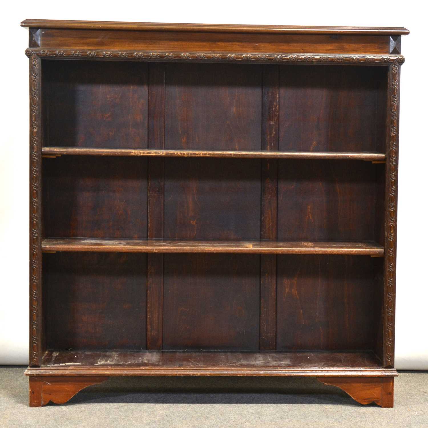 Lot 351 - Stained walnut open bookcase,
