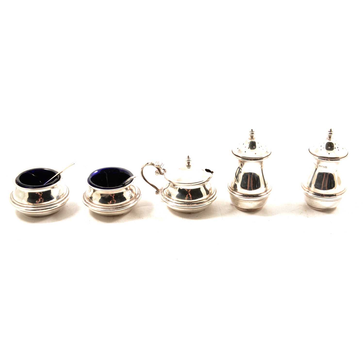 Lot 280 - A silver five piece cruet set with blue