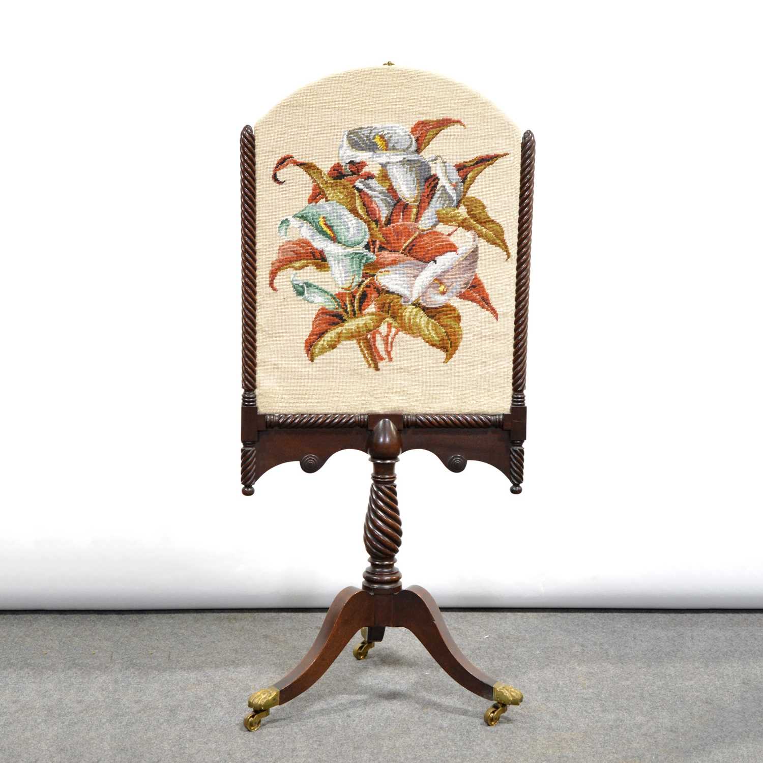 Lot 681 - William IV mahogany pole screen,