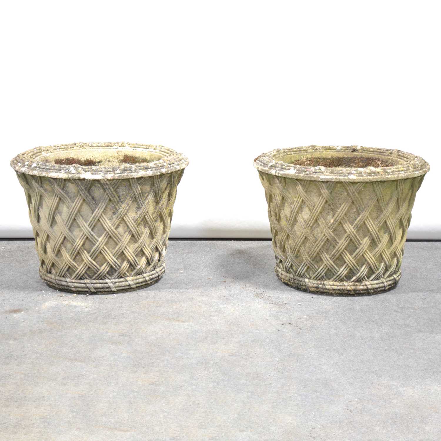 Lot 466 - Pair of Haddonstone basket weave planters,