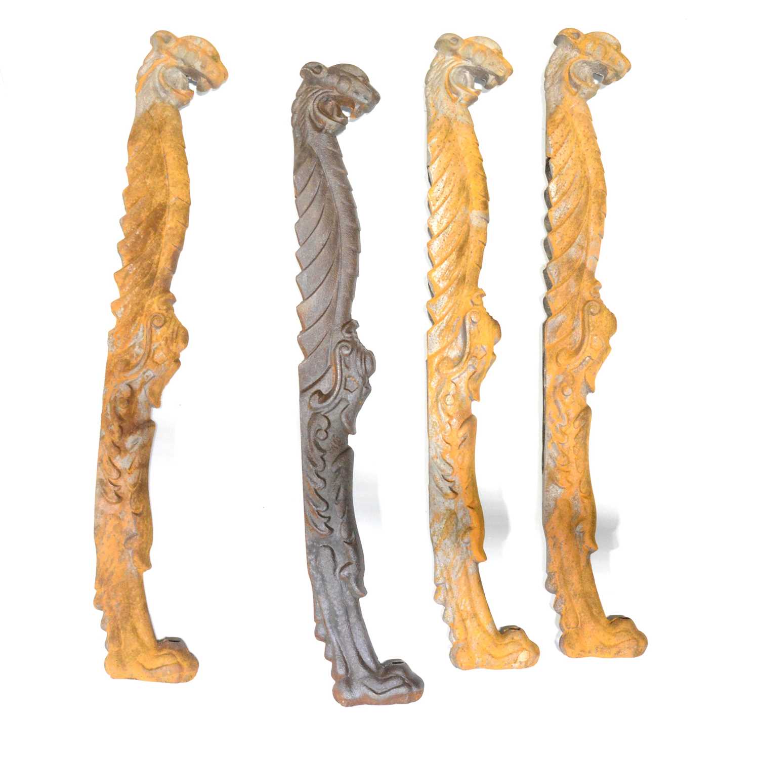 Lot 428 - Four cast iron supports, leopard head