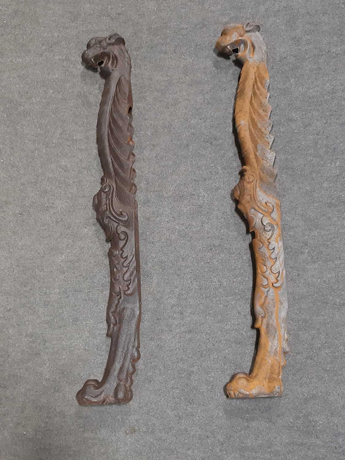 Lot 428 - Four cast iron supports, leopard head