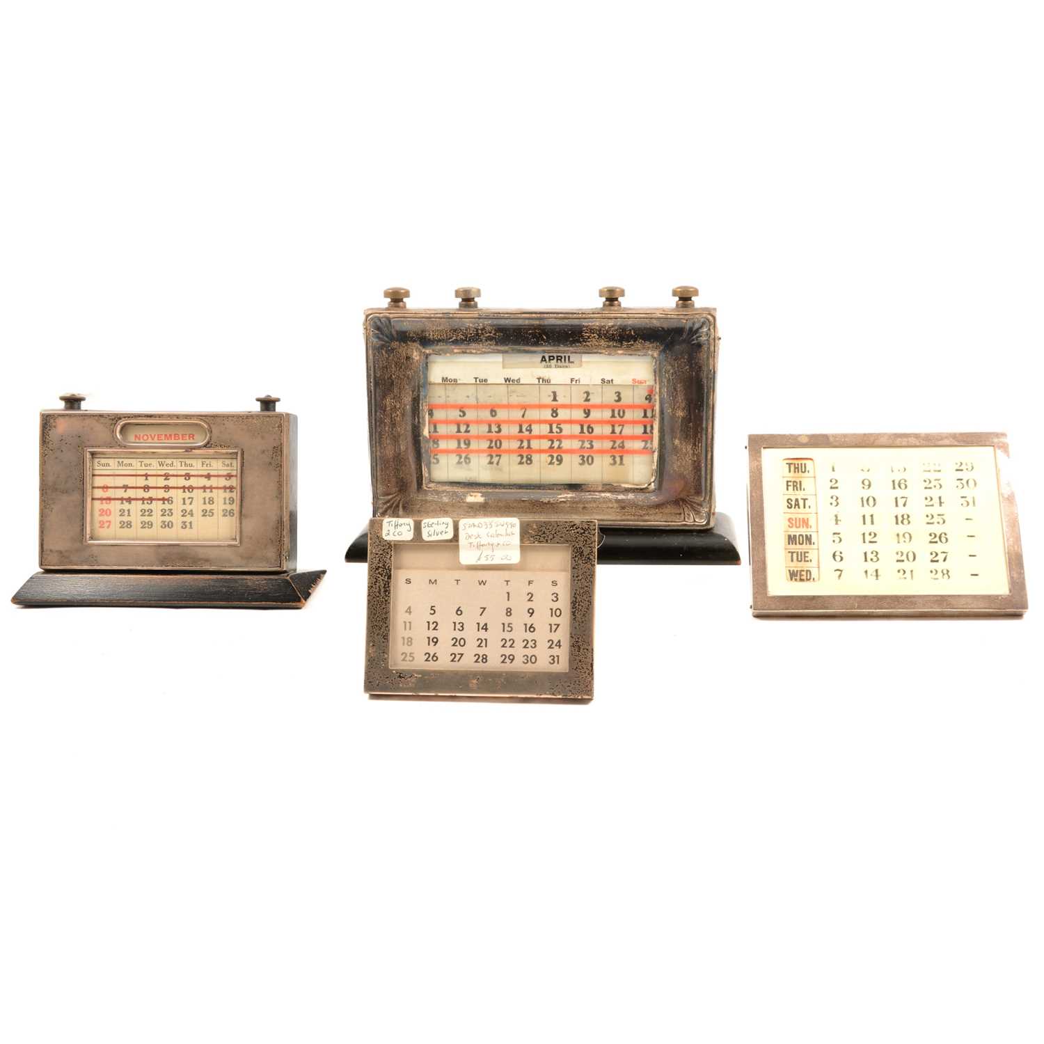 Lot 95 - Four silver mounted desk top perpetual