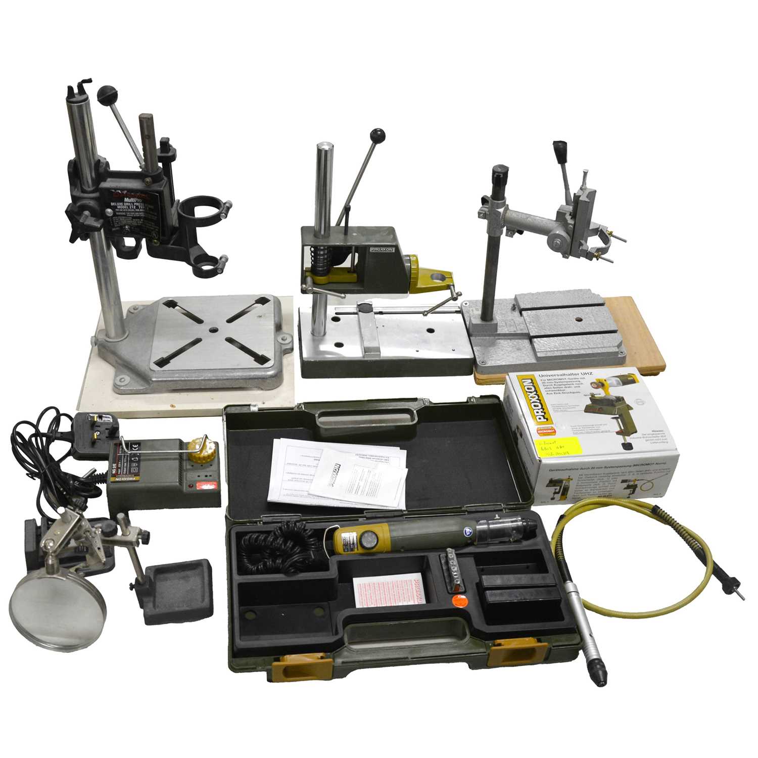 Lot 201 - A proxxon multi-tool, multi-tool stands, and