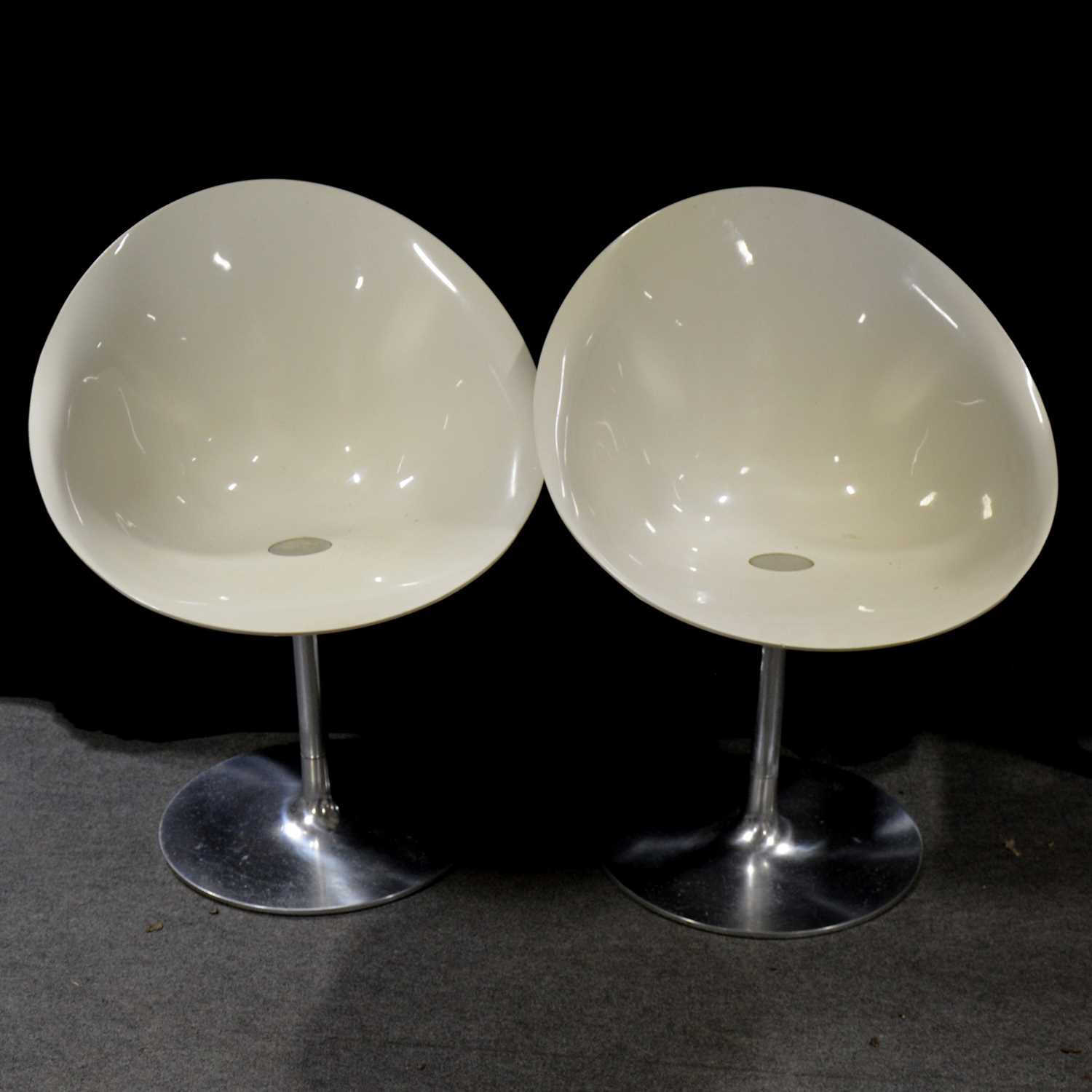 Lot 518 - A set of four 'EroS' swivel chairs, designed