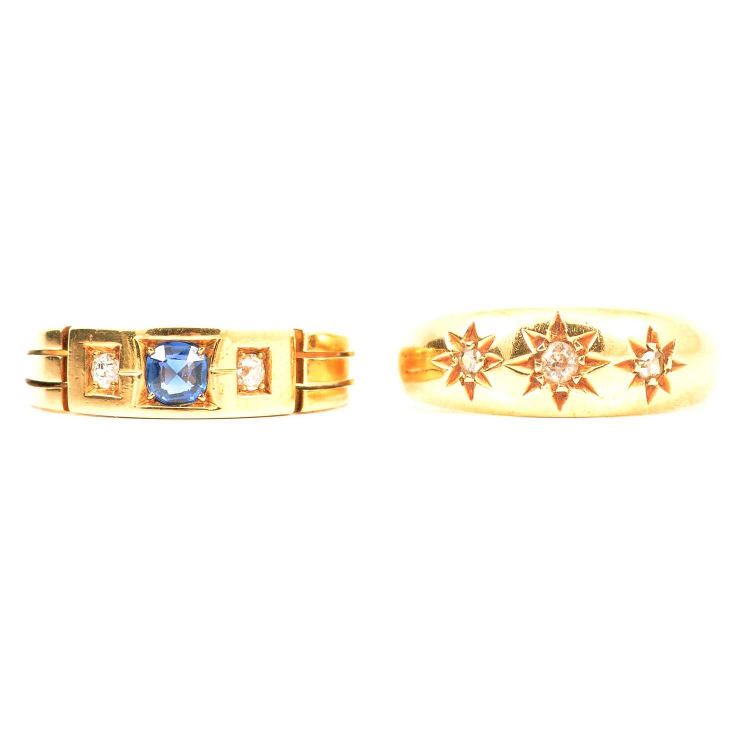 Lot 49 - A diamond three stone gypsy set ring and a