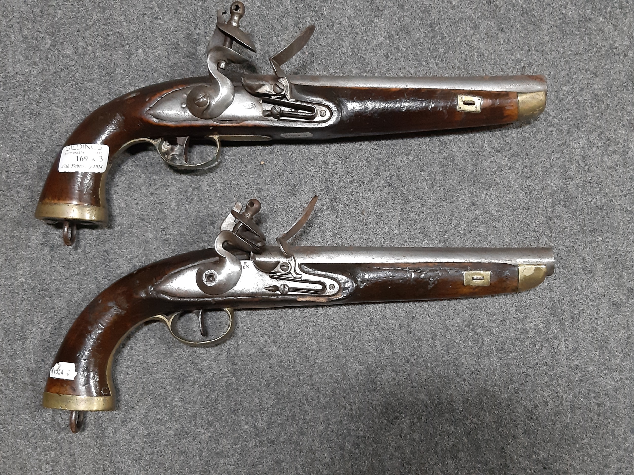 Lot 169 - Two 19th century flintlock pistols, and a