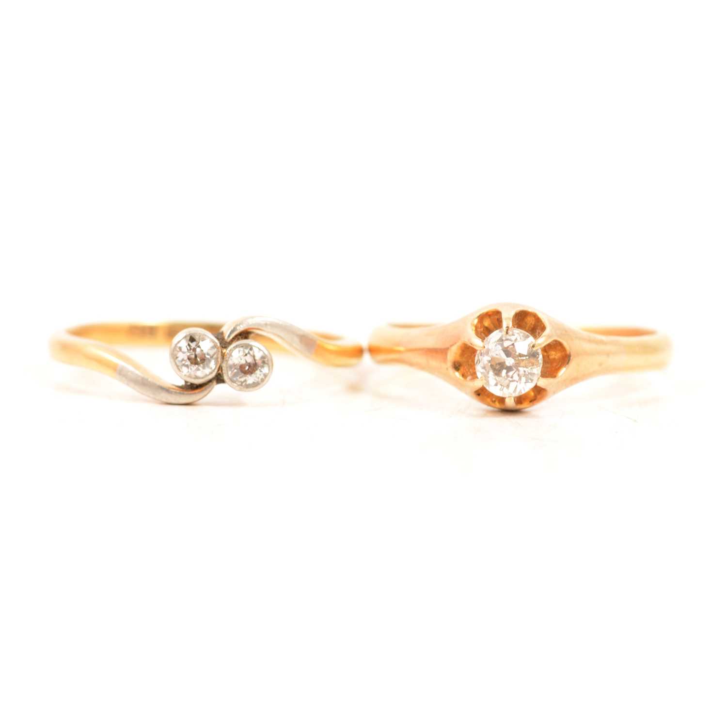 Lot 80 - A diamond solitaire ring and a diamond two