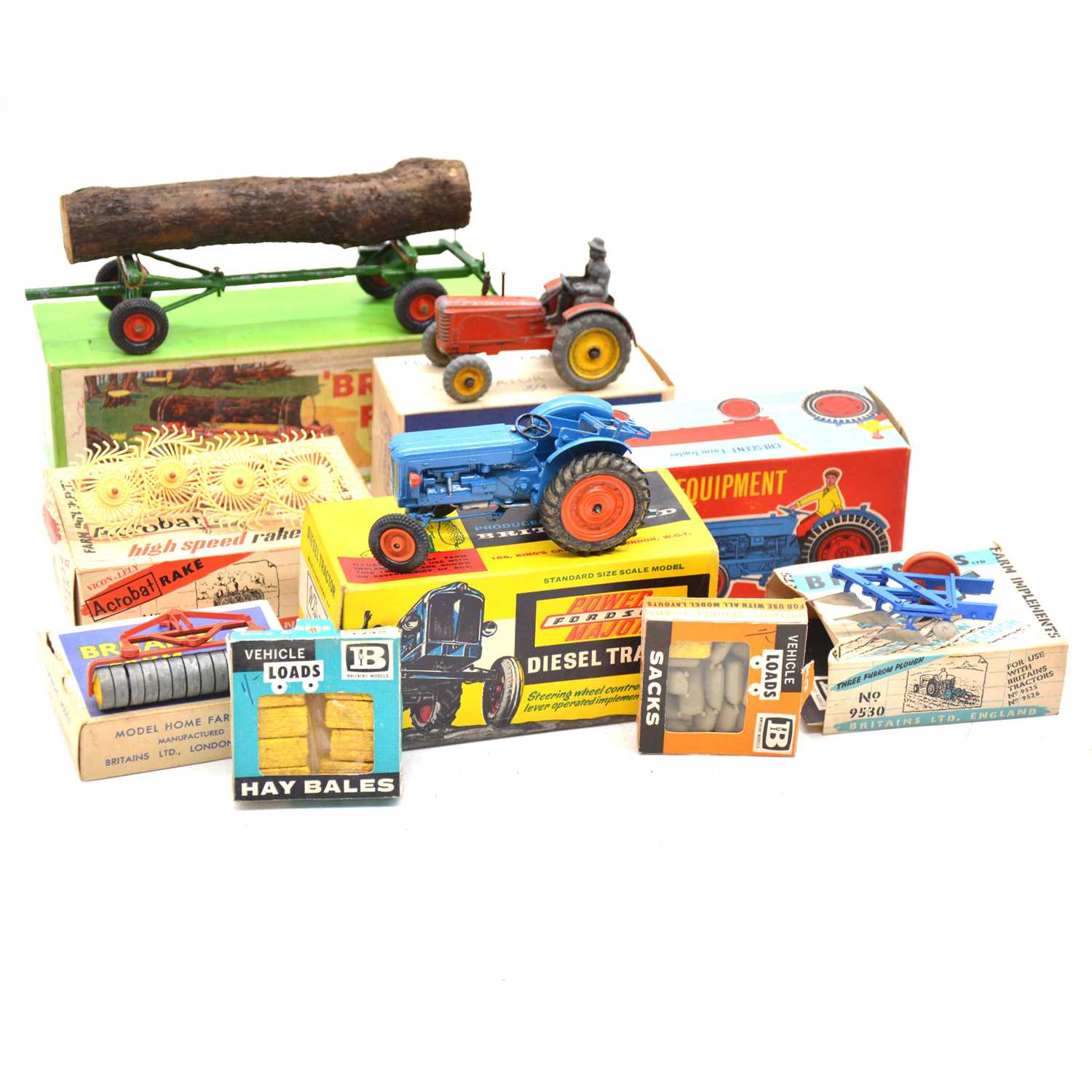 Lot 114 - Nine Britains farm equipment models, mostly