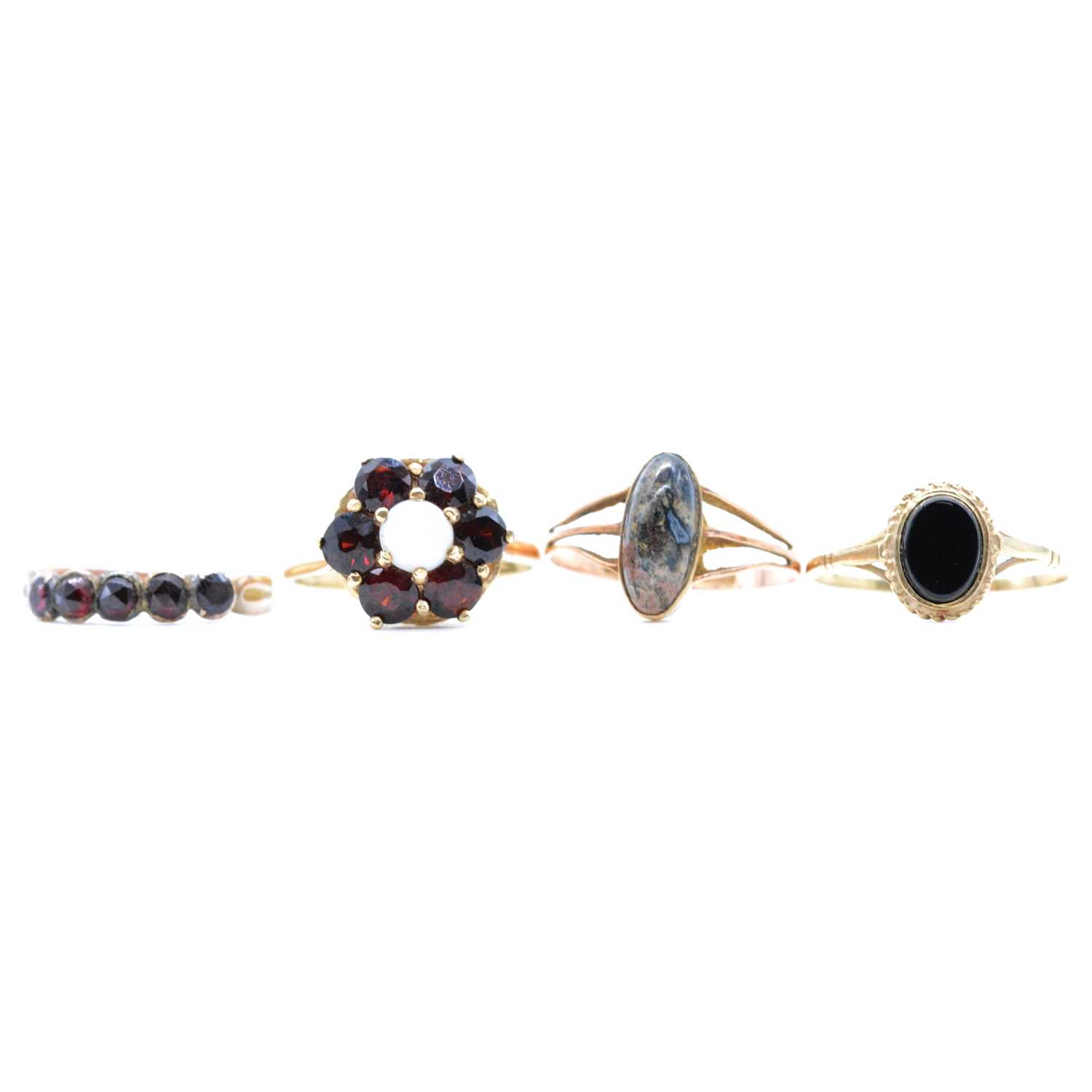 Lot 83 - Four gemset rings, opal and garnet, jasper,