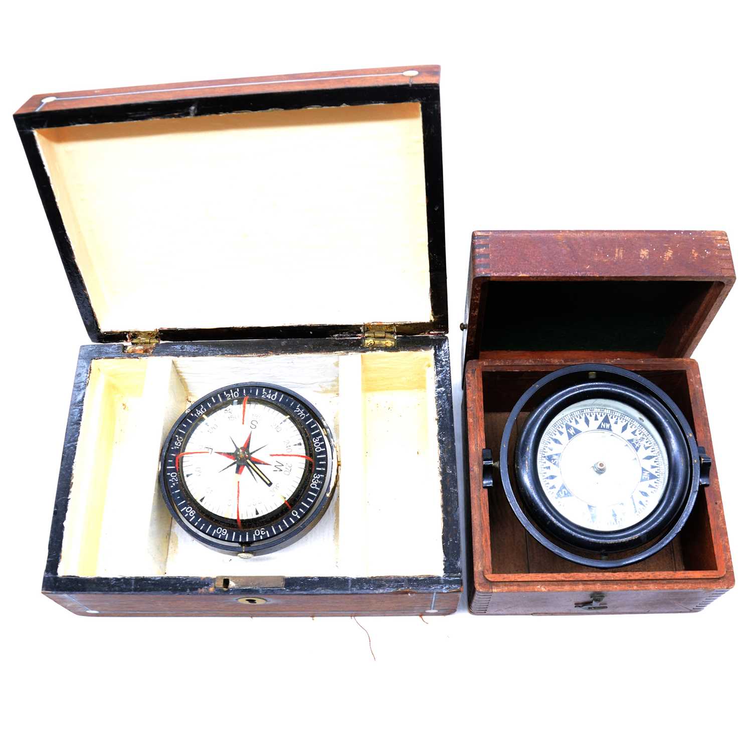 Lot 228 - Two nautical compass,