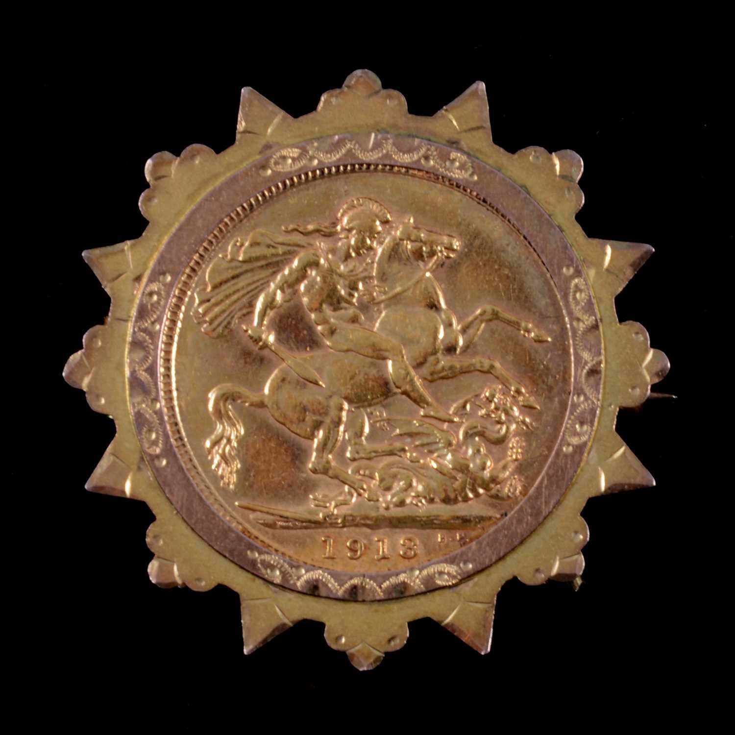 Lot 123 - A Gold Full Sovereign Coin brooch.