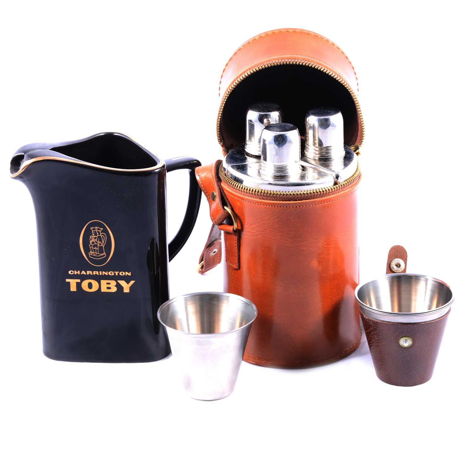 Lot 183 - Three-bottle hunting flask, toddy cups, and