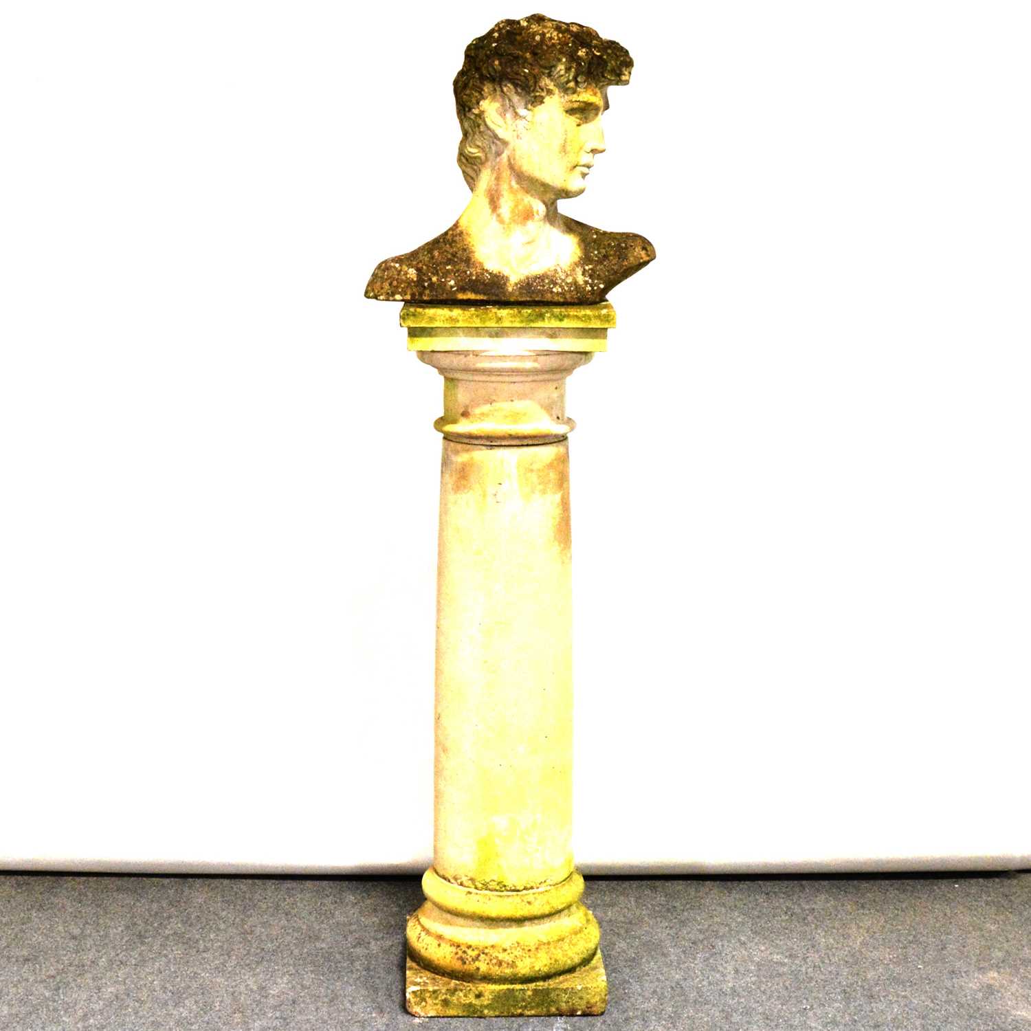 Lot 481 - Reconstituted stone bust, Roman, on a tall