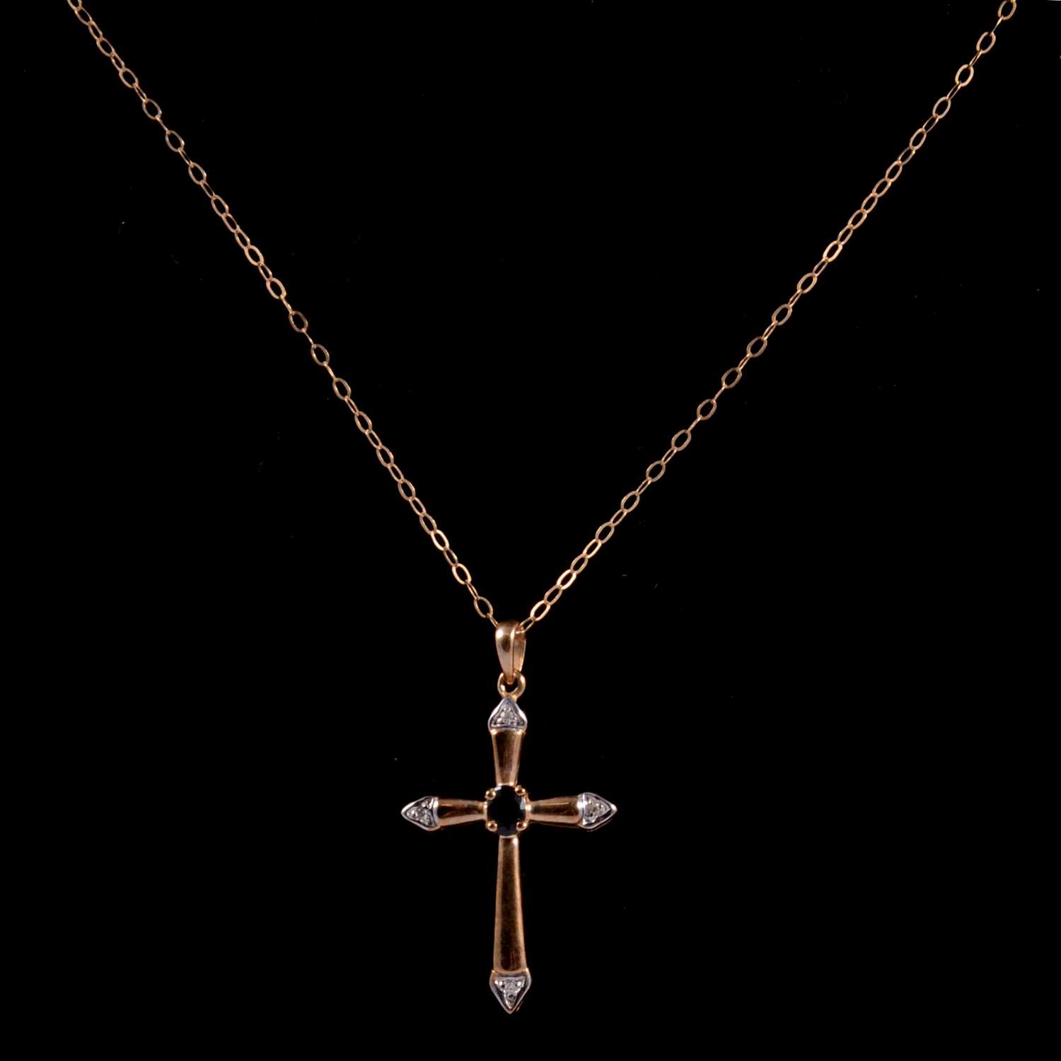 Lot 308 - Two 9 carat gold crosses and chains, one