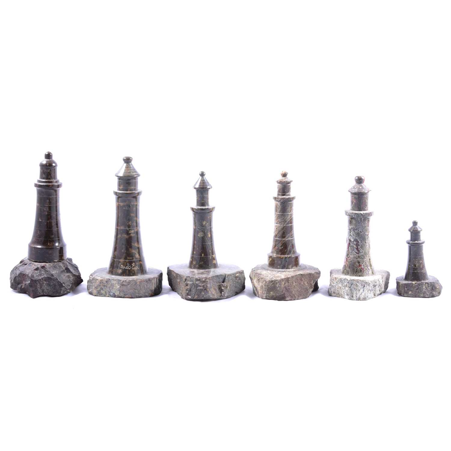 Lot 32 - Six Cornish serpentine lighthouse models,