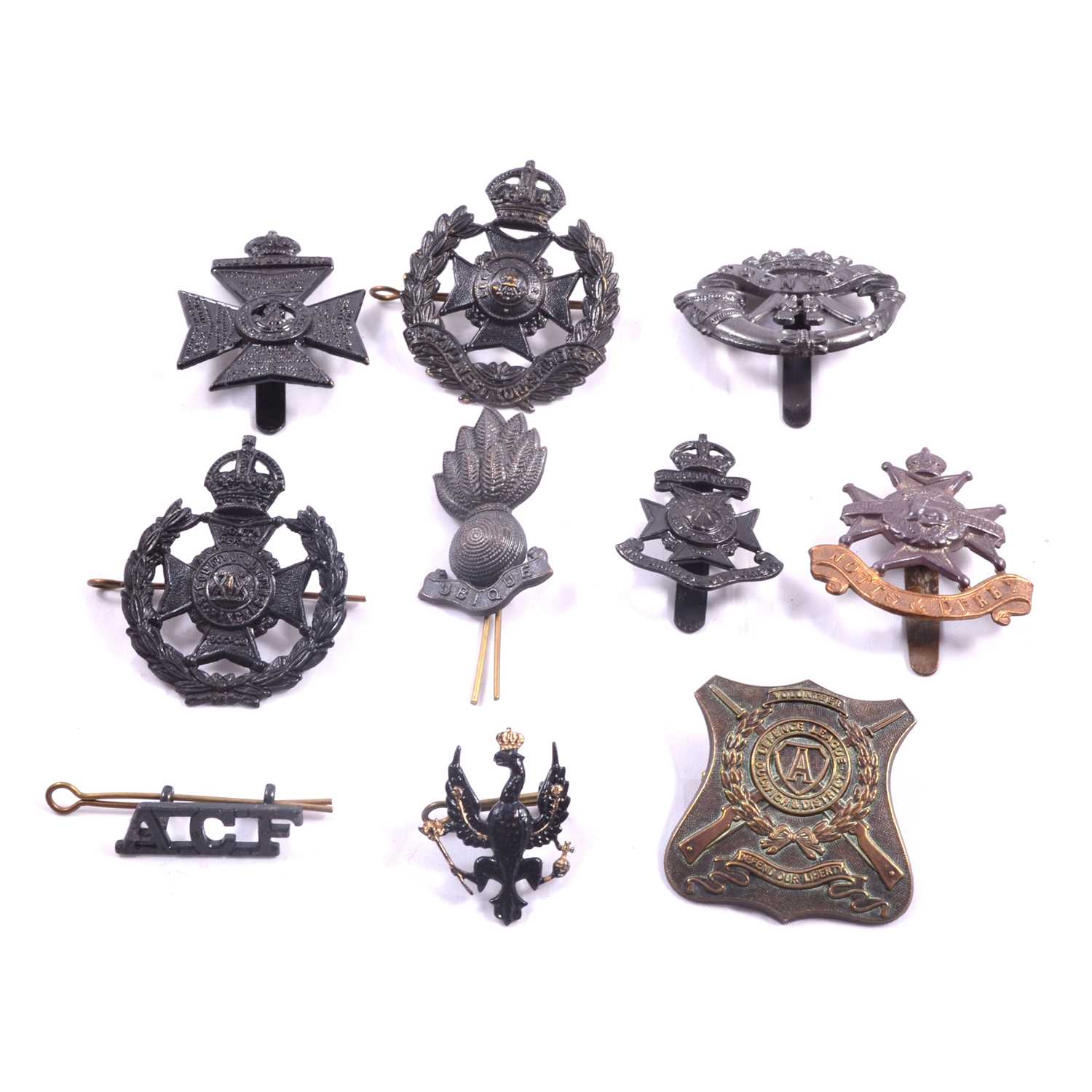 Lot 226 - Small collection of military cap badges,