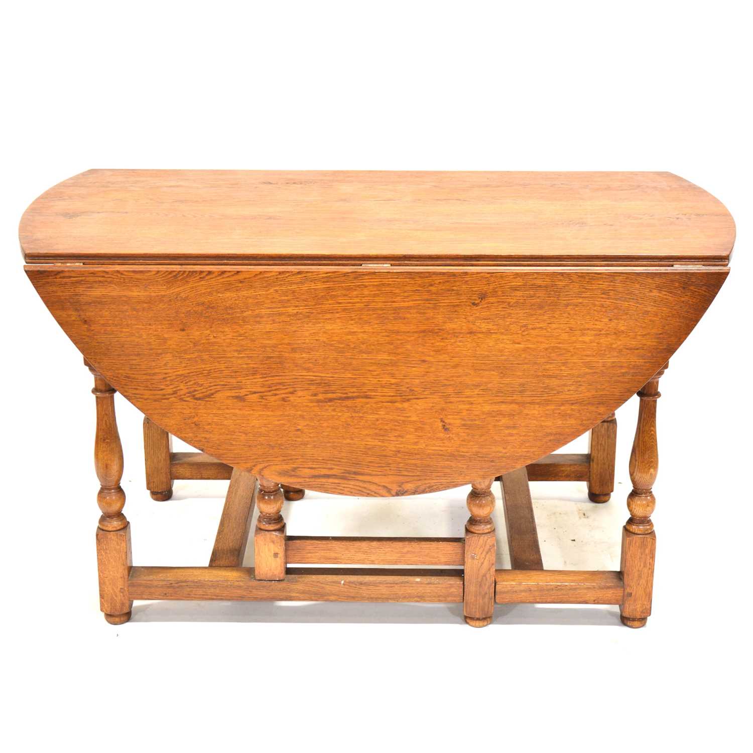 Lot 431 - Light oak gateleg dining table